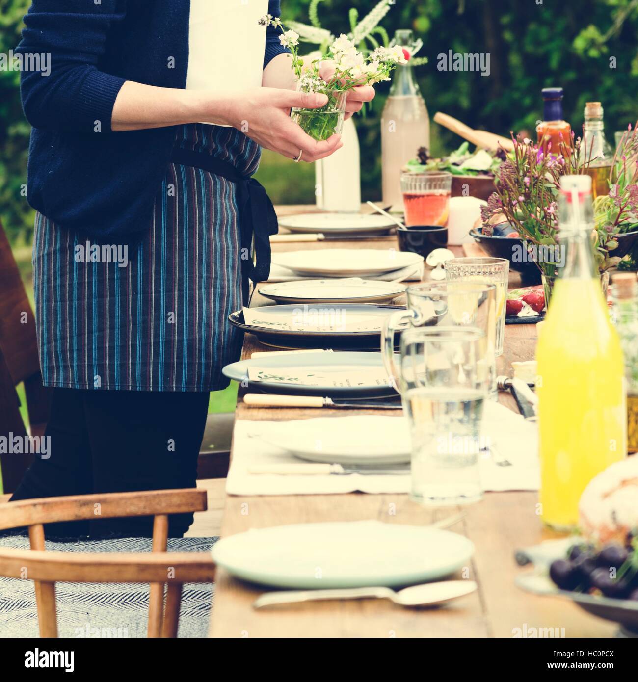 Woman Preparing Table Dinner Concept Stock Photo - Alamy