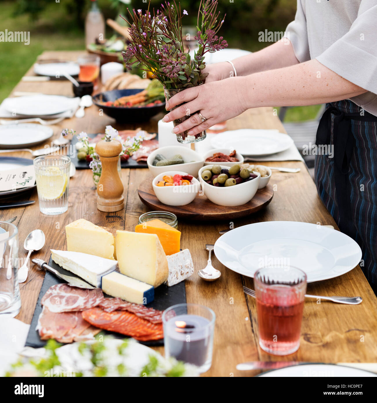 Woman Preparing Table Dinner Concept Stock Photo - Alamy