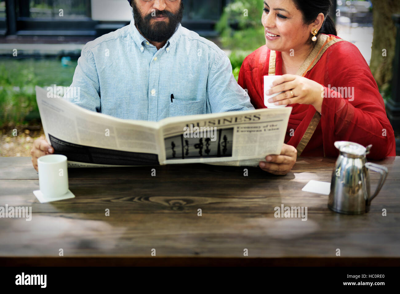 Indian Couple Reading Newspaper Concept Stock Photo - Alamy