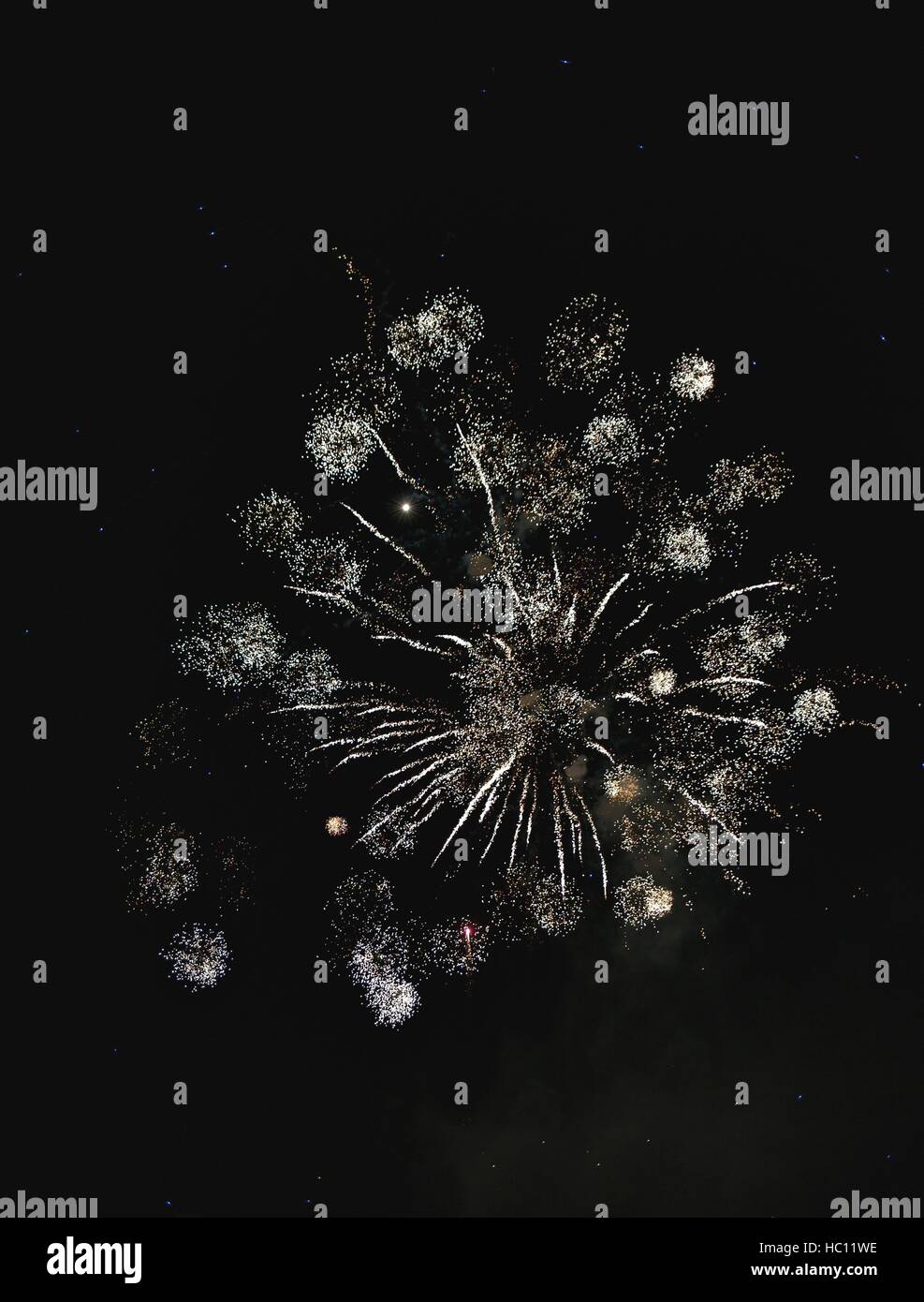Shiny natural fireworks on dark sky background with little smoke Stock ...