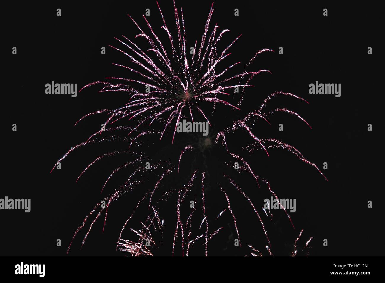 Shiny natural fireworks on dark sky background with little smoke Stock ...