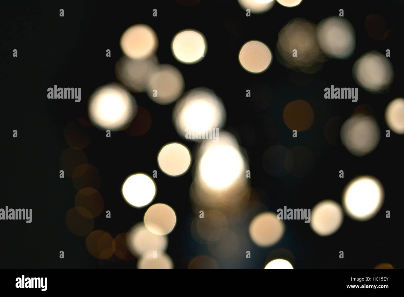 Light blur and defocus bokeh circles lanterns on black sky background ...