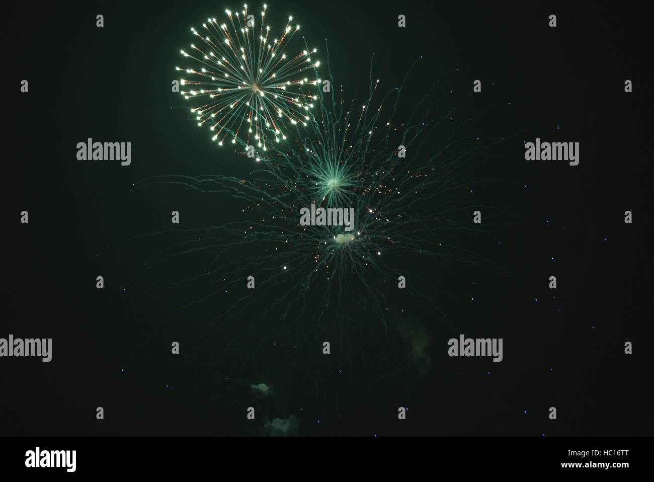 Shiny natural fireworks on dark sky background with little smoke Stock ...