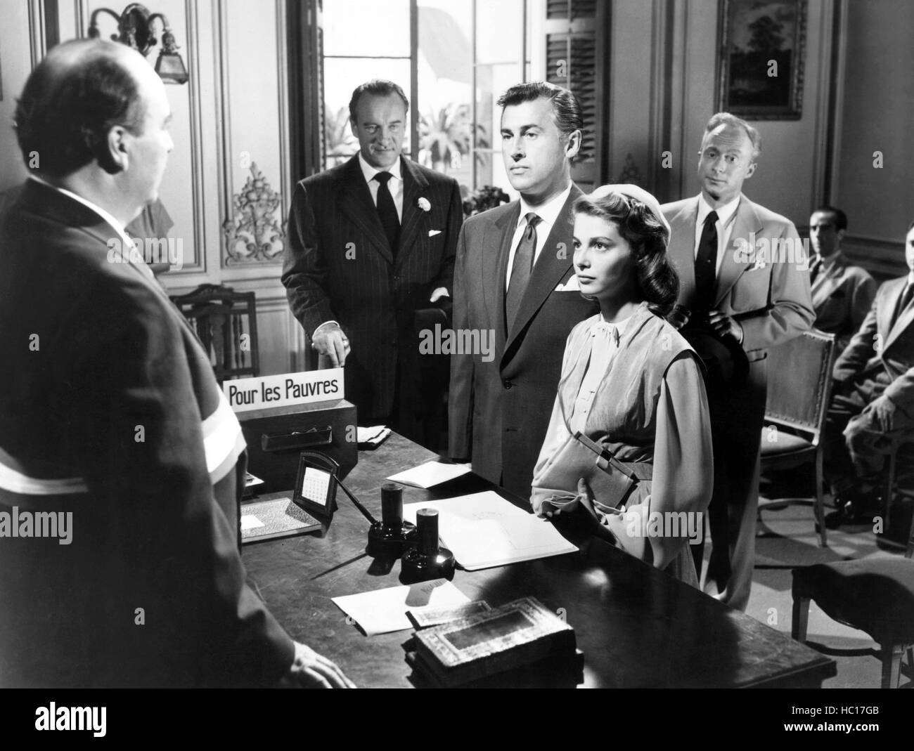 THE LIGHT TOUCH, facing front from left: George Sanders, Stewart ...