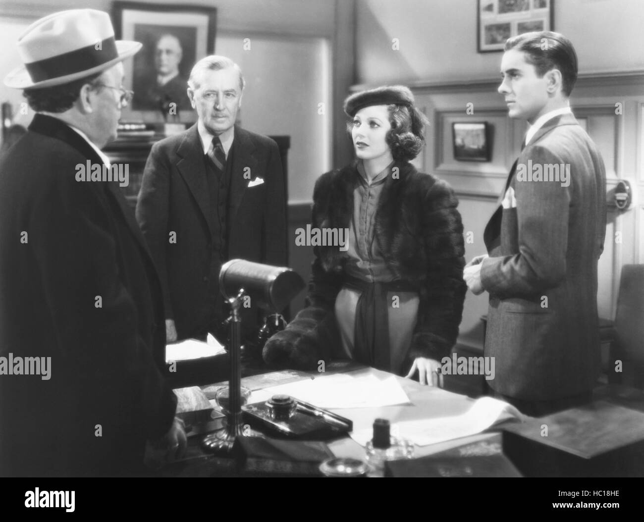 LOVE IS NEWS, from left: Dudley Digges, Frederick Burton, Loretta Young ...