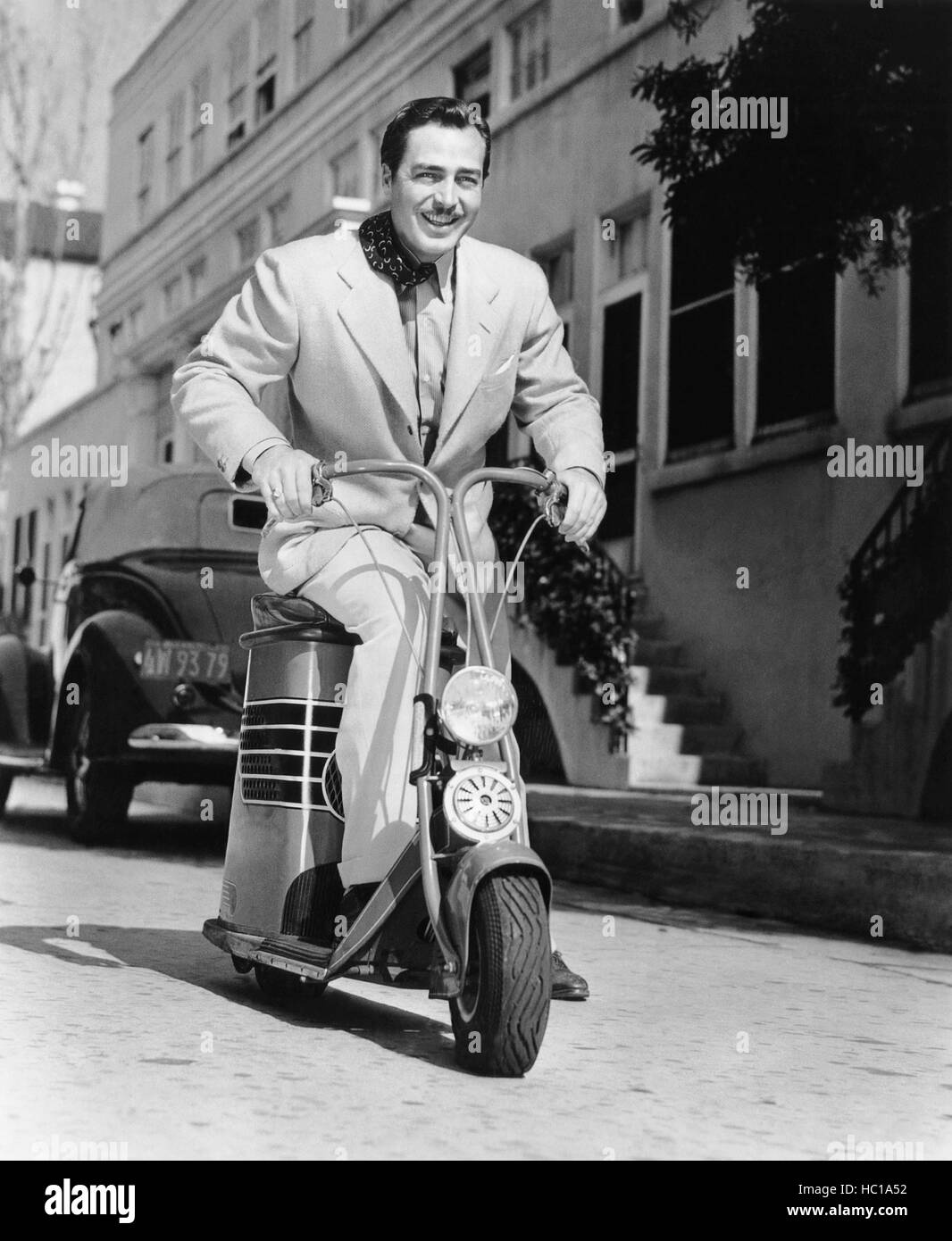THE MAD DOCTOR, John Howard, on his way to the sound stage, 1941 Stock ...