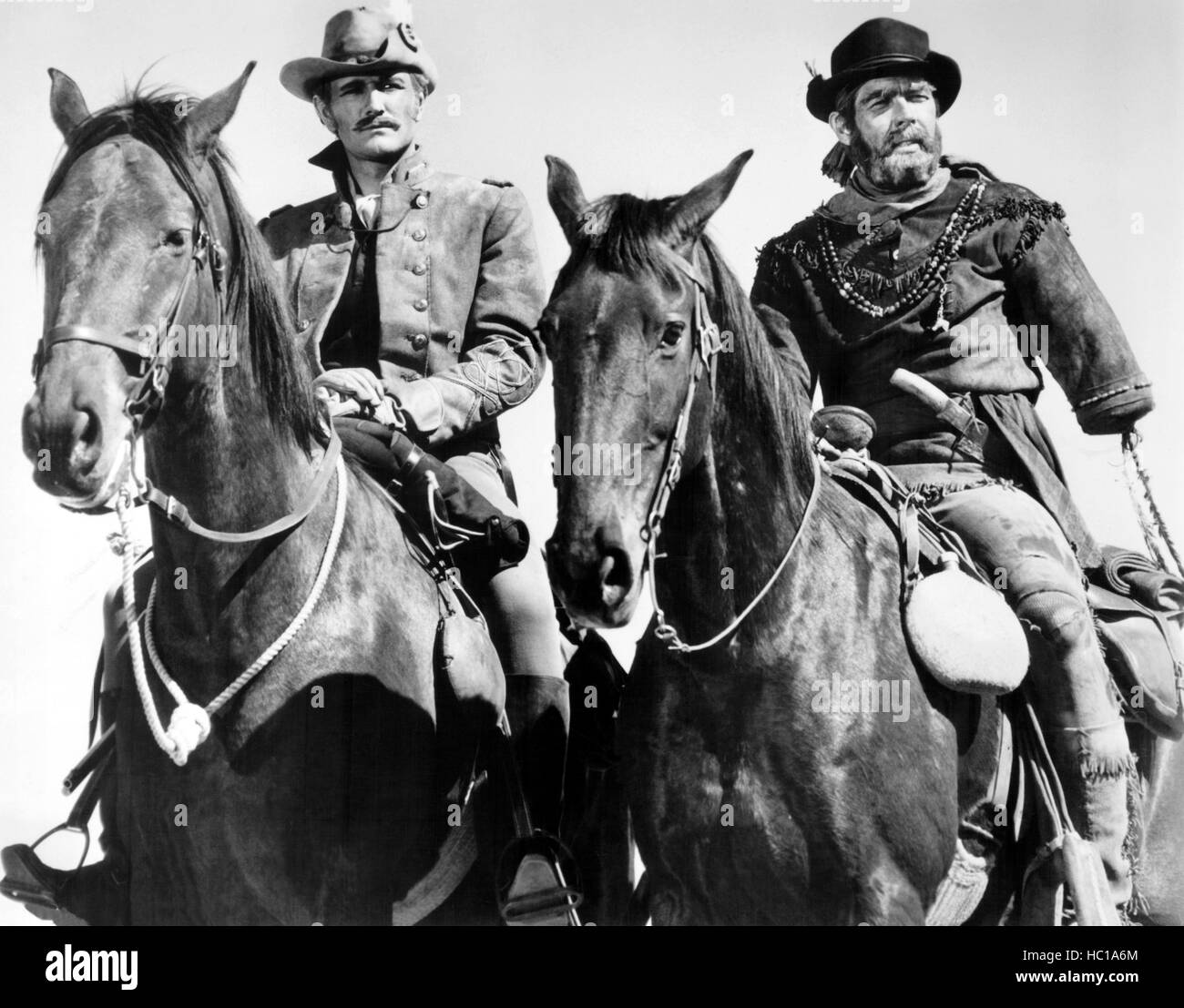 MAJOR DUNDEE, from left: Richard Harris, James Coburn, 1965 Stock Photo ...