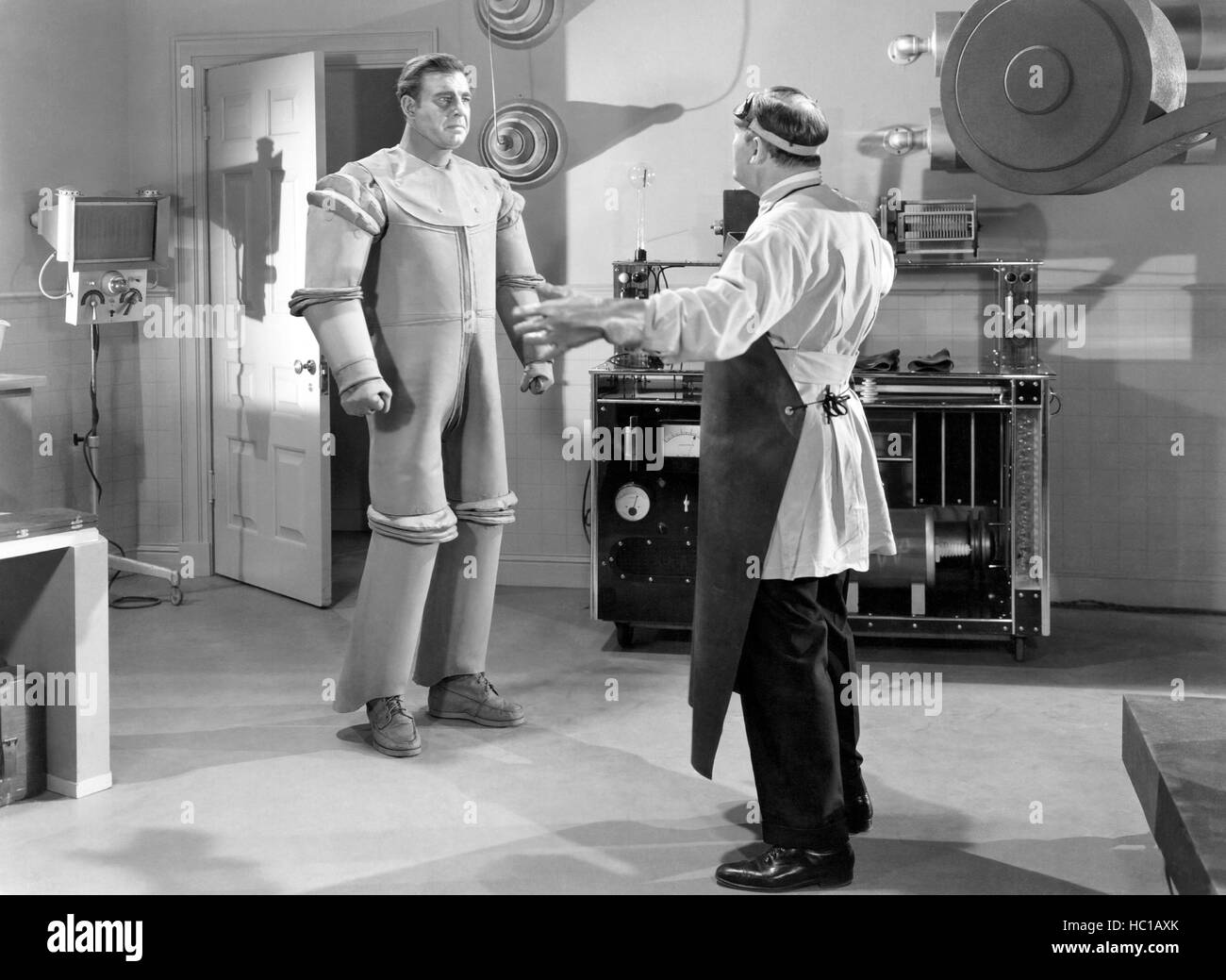 MAN MADE MONSTER, (aka ATOMIC MONSTER), l-r: Lon Chaney Jr., Lionel ...