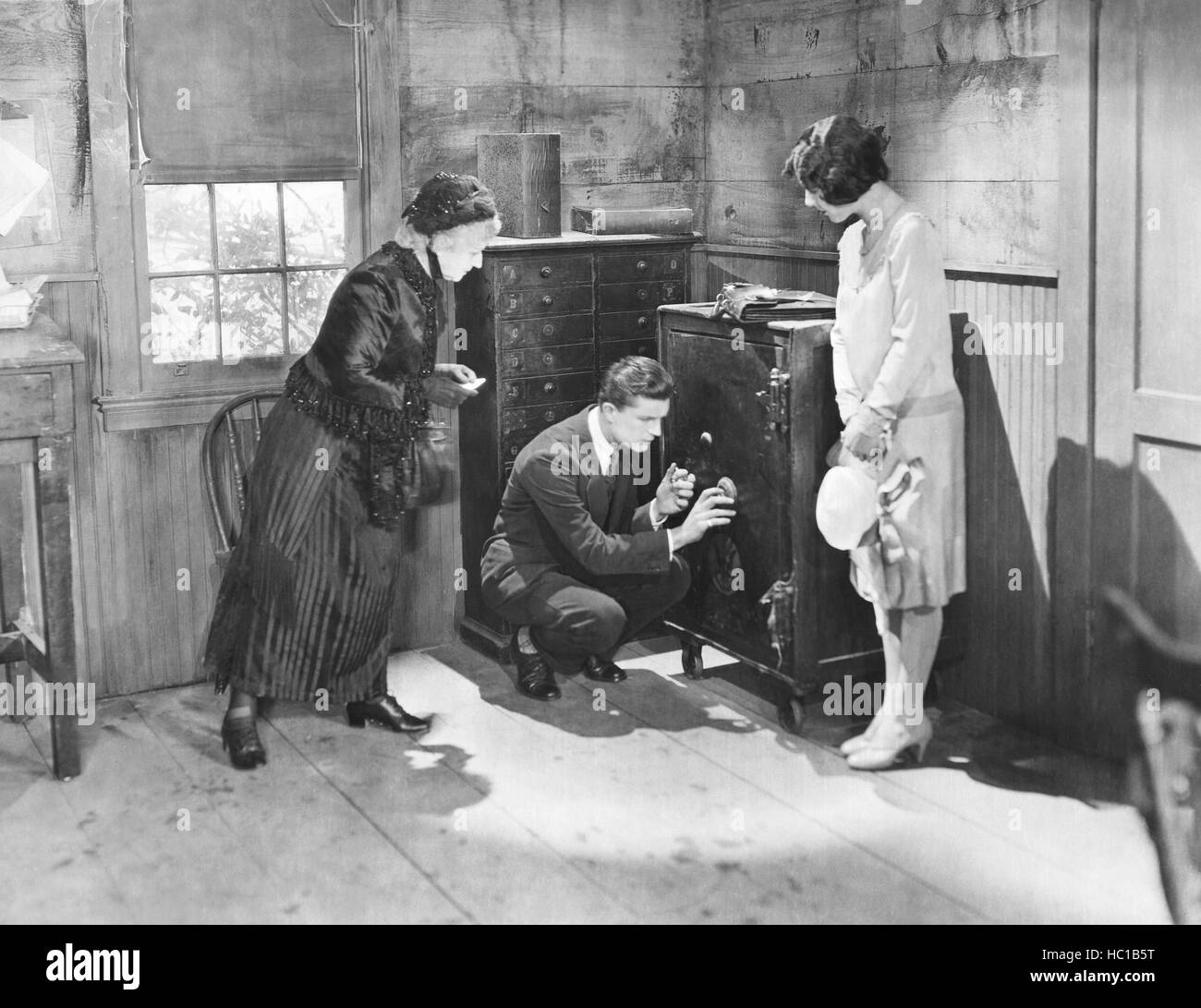 THE MASKED MENACE, from left: Laura Alberta, Larry Kent, Jean Arthur ...