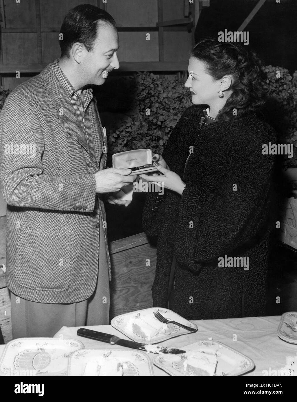 MR. ACE, director Edwin L. Marin, Sylvia Sidney, at on-set birthday ...