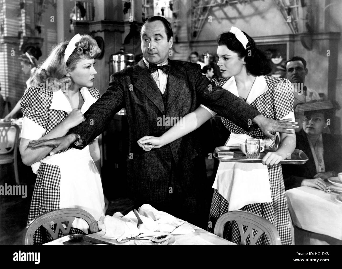 MILDRED PIERCE, from left, Joyce Compton, George Tobias, Lynn Baggett ...