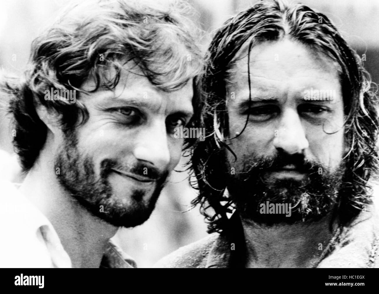 THE MISSION, from left: director Roland Joffe, Robert De Niro on set ...
