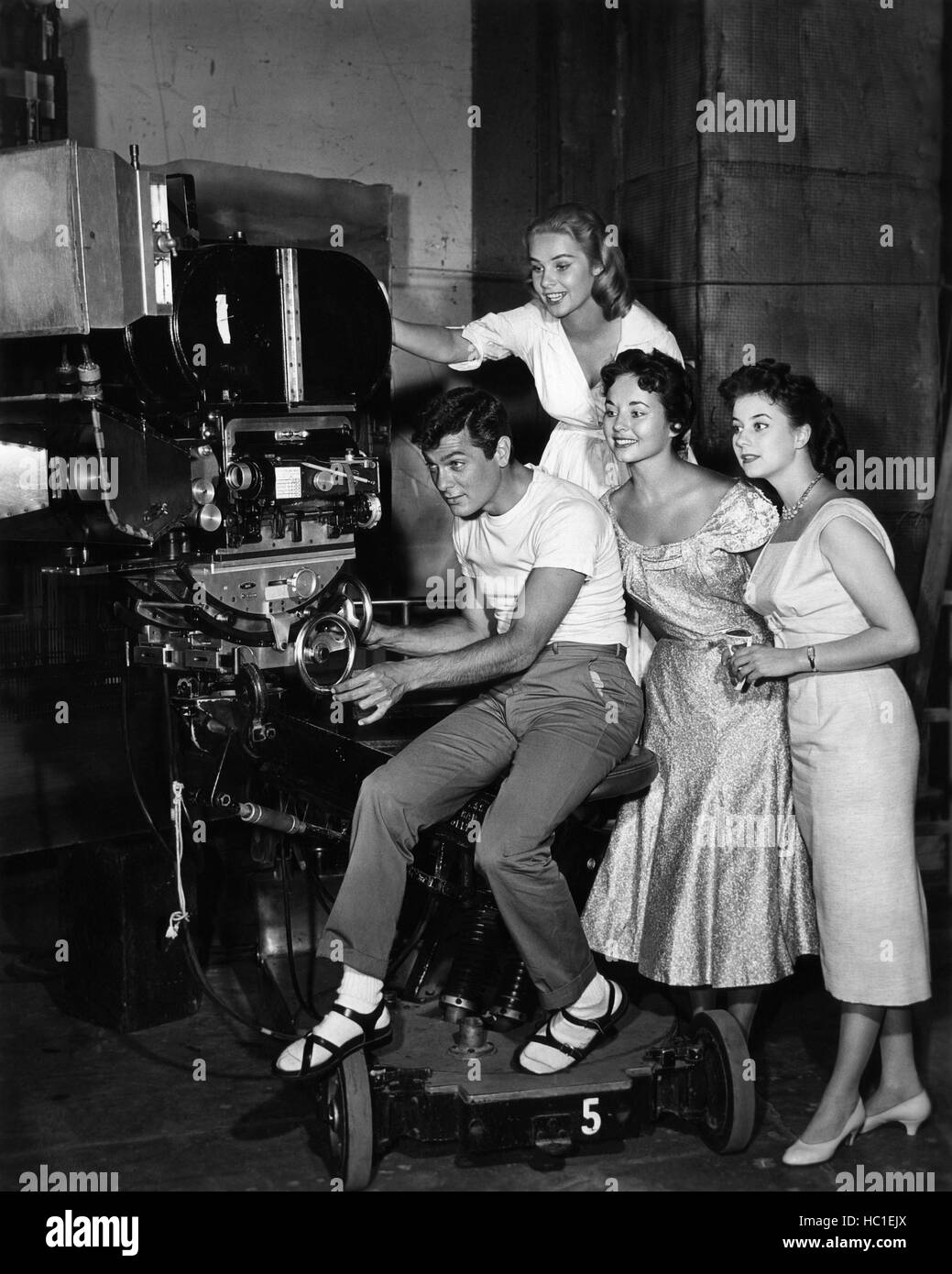 THE MIDNIGHT STORY, Tony Curtis, demonstrating a CinemaScope camera for ...