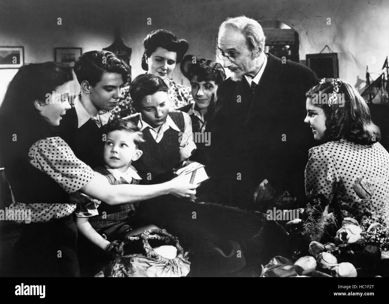 MR. EMMANUEL, holding box from left: Jean Simmons, Felix Aylmer ...