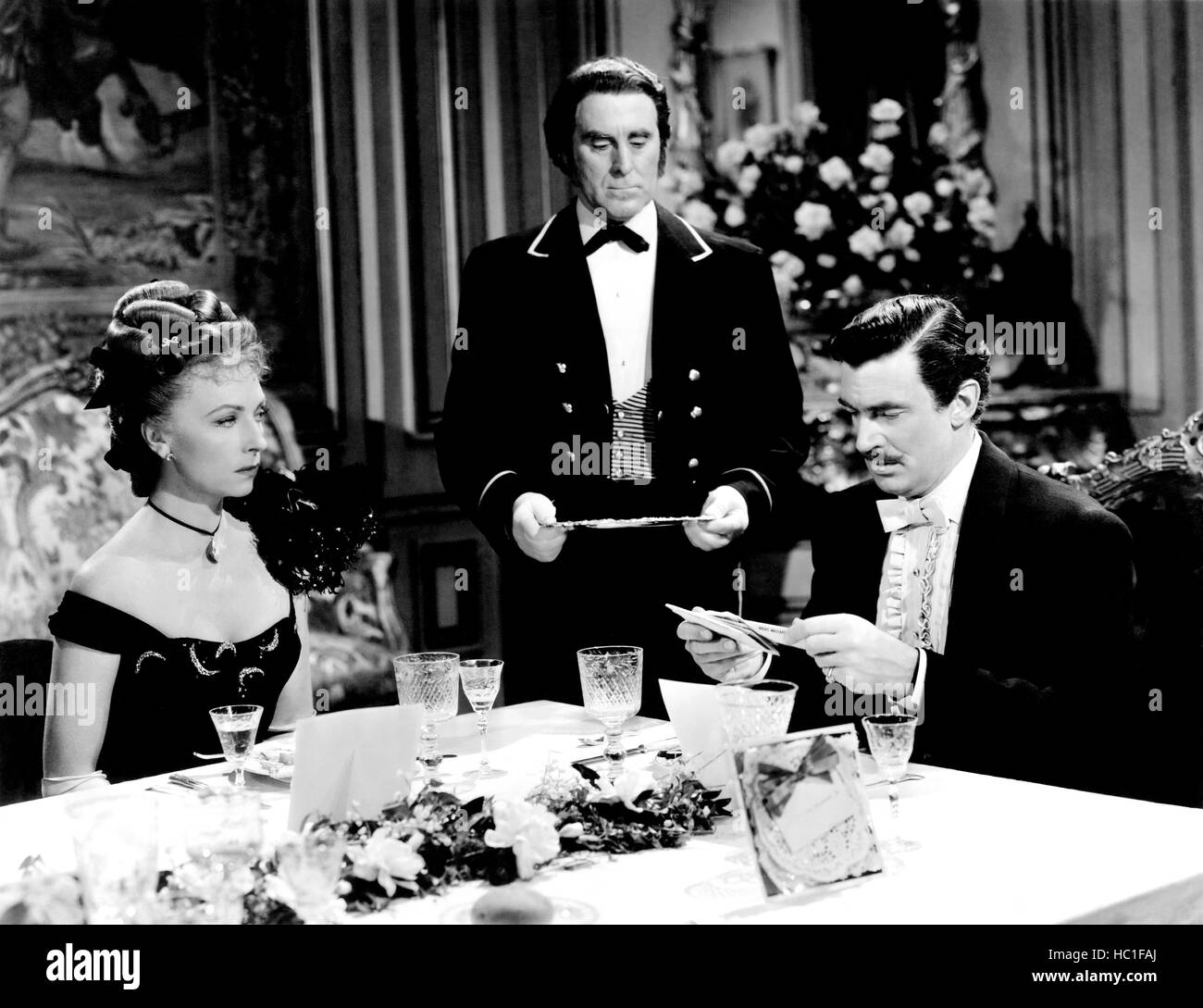 MRS. PARKINGTON, from left, seated, Agnes Moorehead, Walter Pidgeon ...