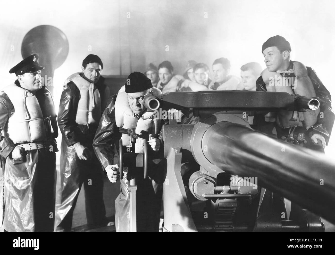 THE NAVY COMES THROUGH, from left: Pat O'Brien, Max Baer (rear), Frank ...