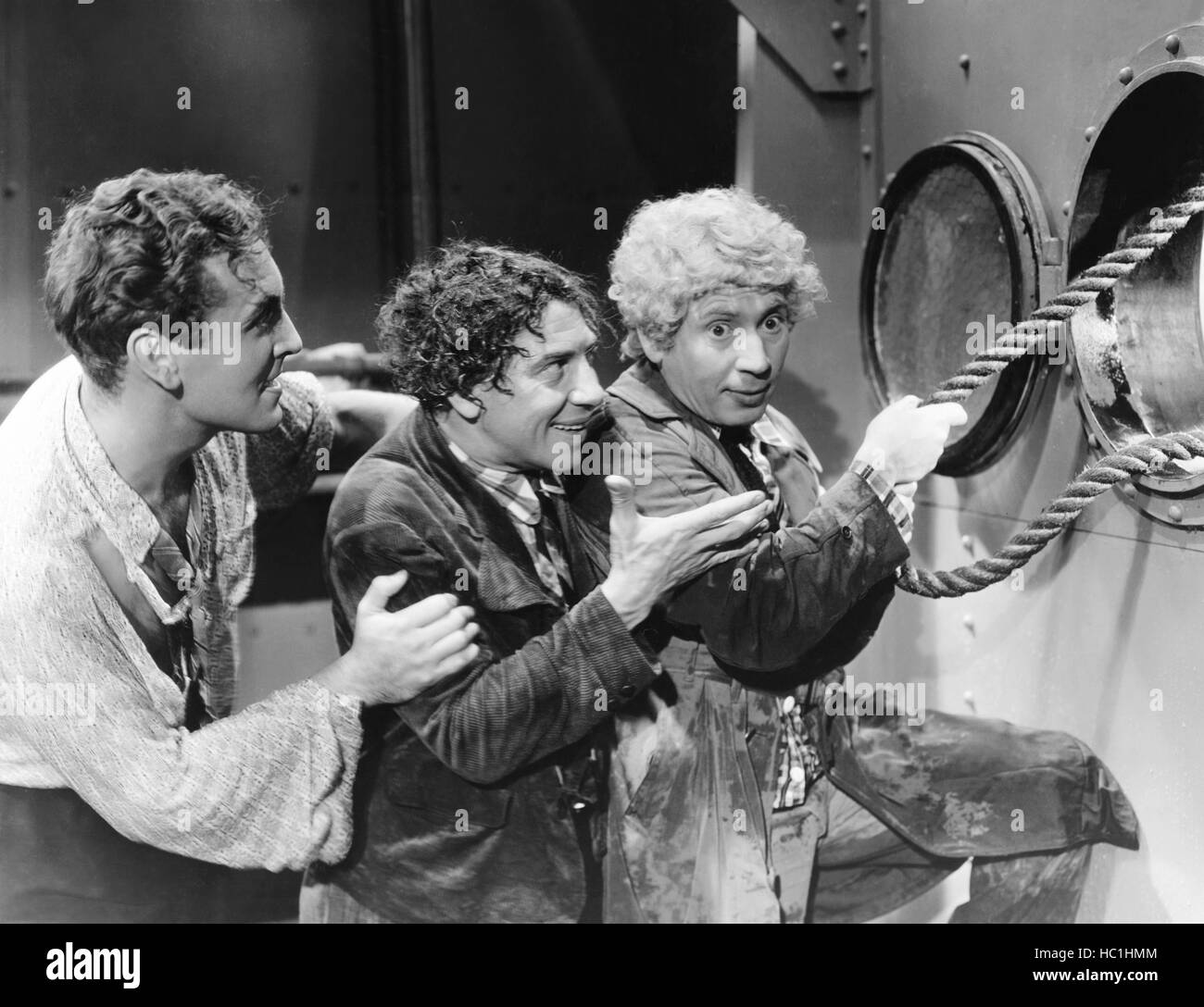 A NIGHT AT THE OPERA, from left, Allan Jones, Chico Marx, Harpo Marx ...