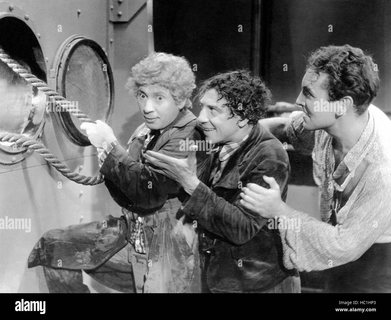 A NIGHT AT THE OPERA, from left: Harpo Marx, Chico Marx, Allan Jones ...