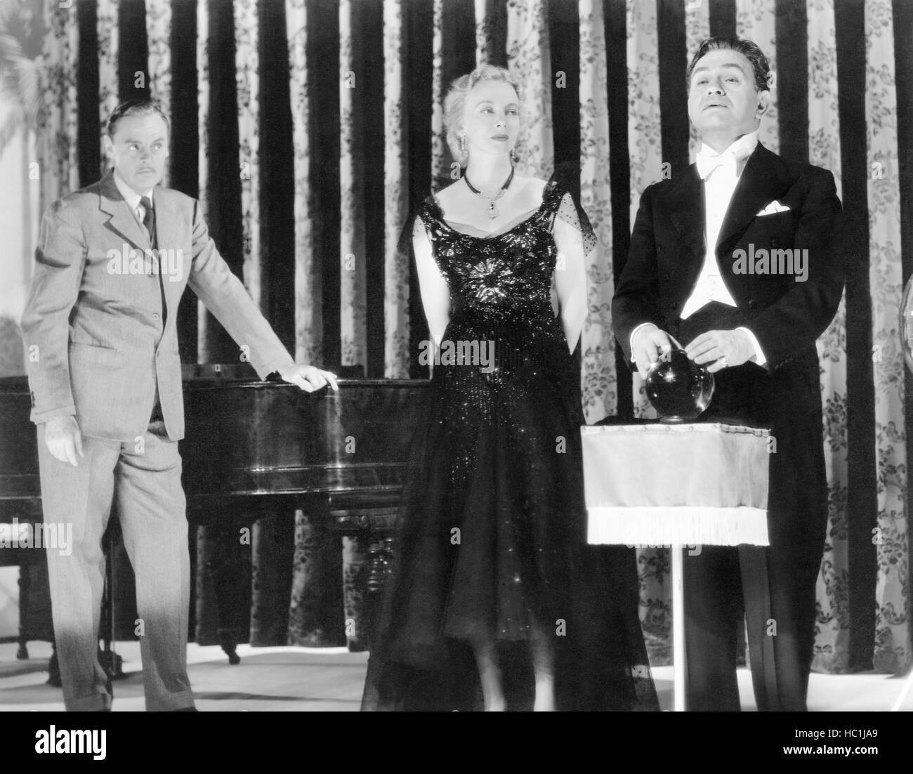 NIGHT HAS A THOUSAND EYES, from left: Jerome Cowan, Virginia Bruce ...