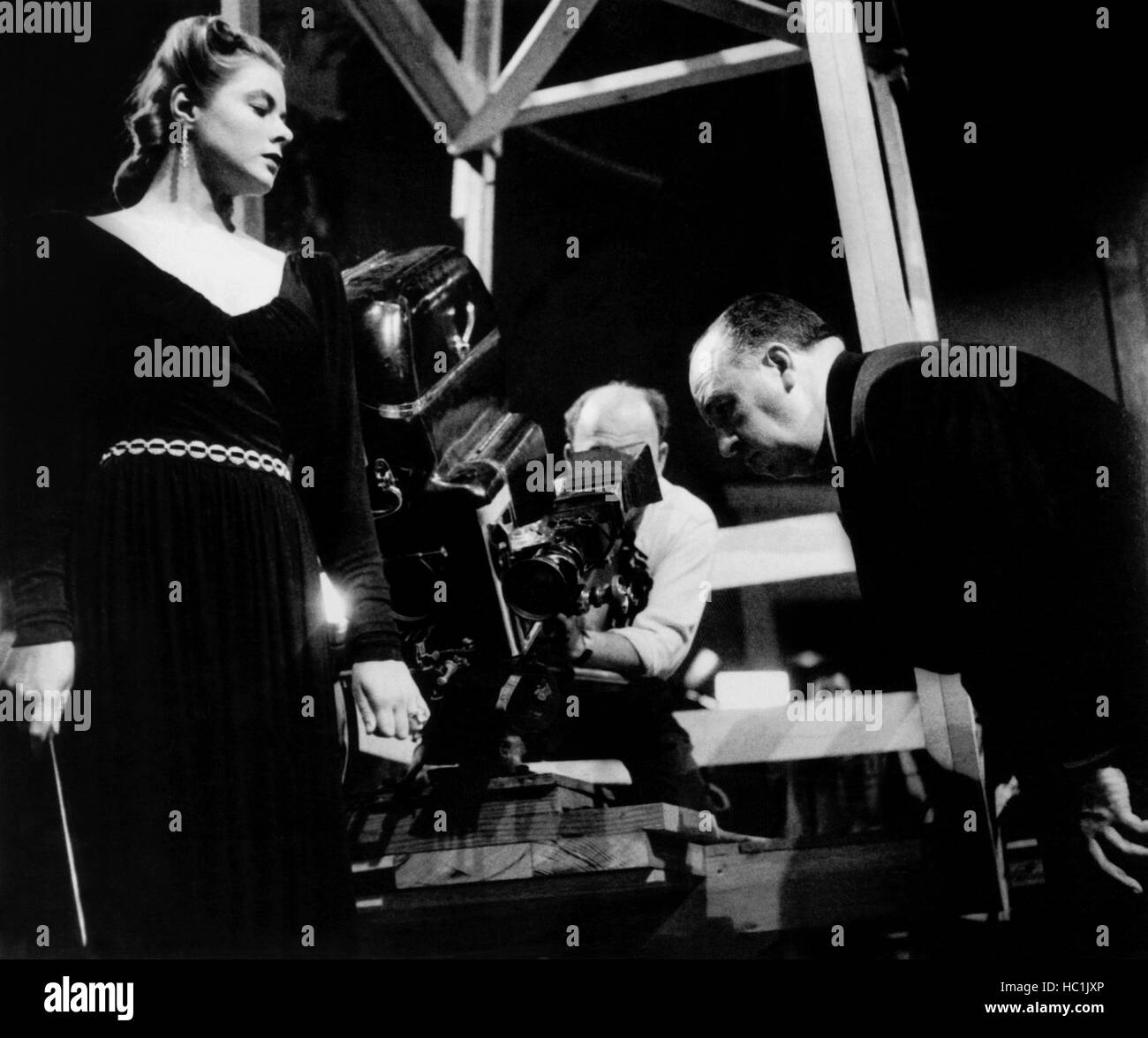 NOTORIOUS, from left, Ingrid Bergman, director Alfred Hitchcock, on-set ...