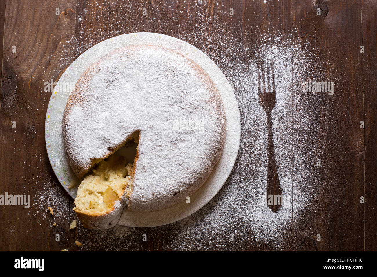 apple pie lying on a dark wooden table Stock Photo - Alamy