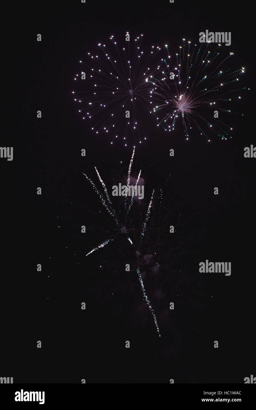 Shiny natural fireworks on dark sky background with little smoke Stock ...
