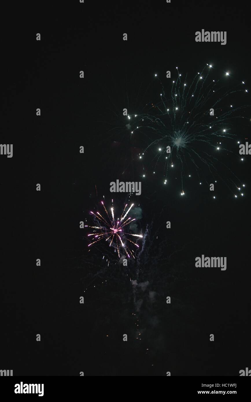 Shiny natural fireworks on dark sky background with little smoke Stock ...
