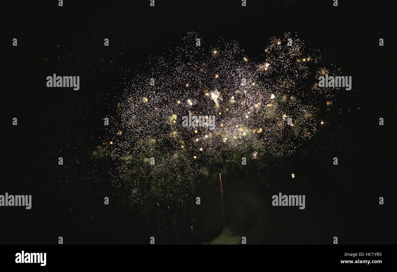 Shiny natural fireworks on dark sky background with little smoke Stock ...