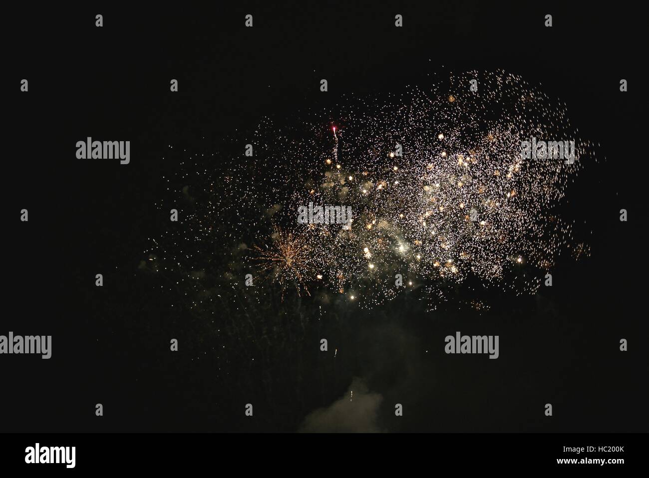 Shiny natural fireworks on dark sky background with little smoke Stock ...