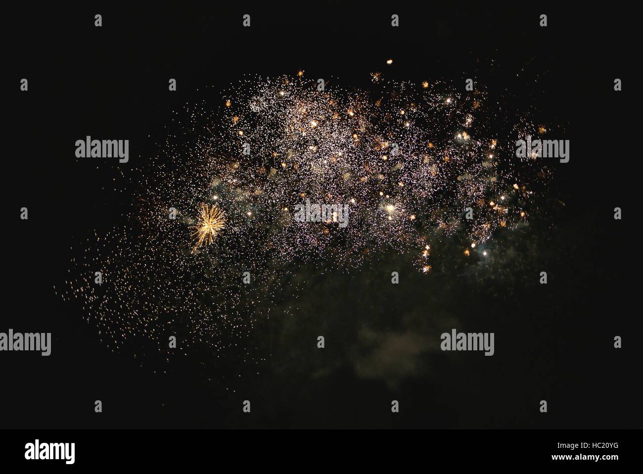 Shiny natural fireworks on dark sky background with little smoke Stock ...