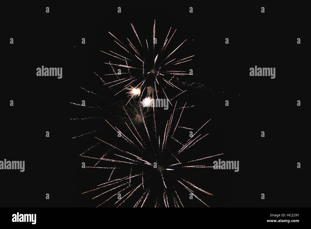 Shiny natural fireworks on dark sky background with little smoke Stock ...
