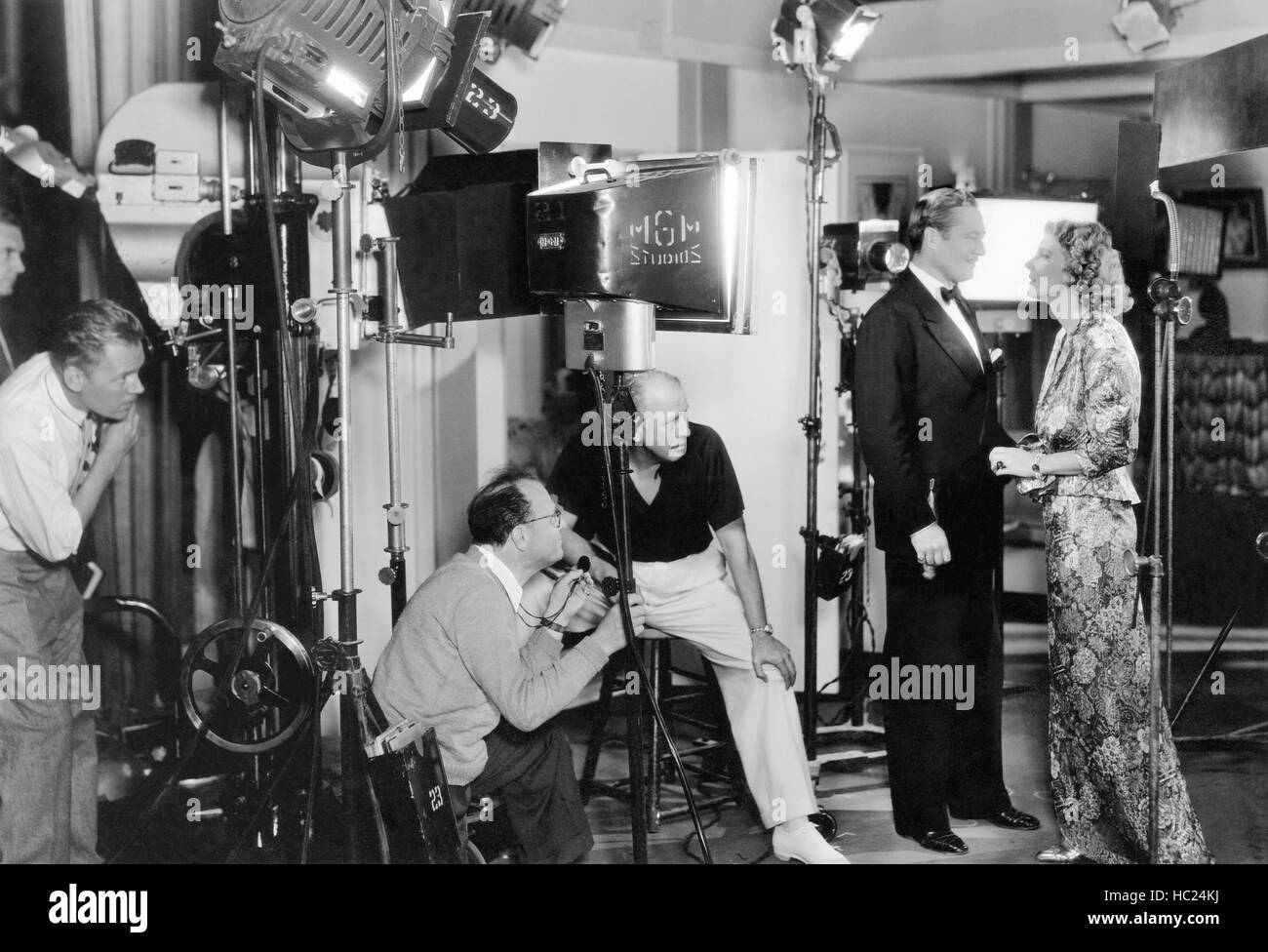 MAD HOLIDAY, from left of center: camerman Joe Ruttenberg, director ...