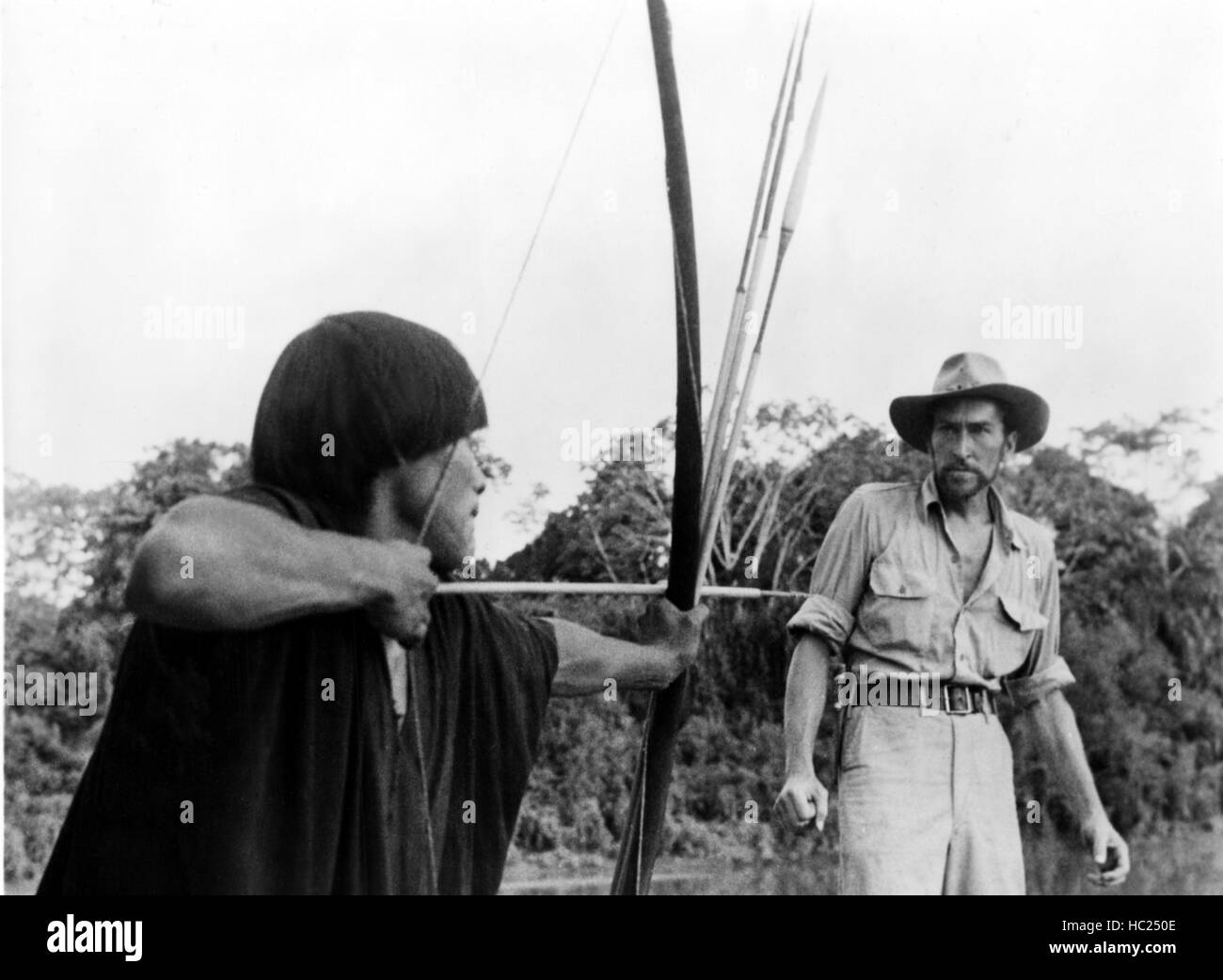 MANHUNT IN THE JUNGLE, right: Robin Hughes, 1958 Stock Photo - Alamy