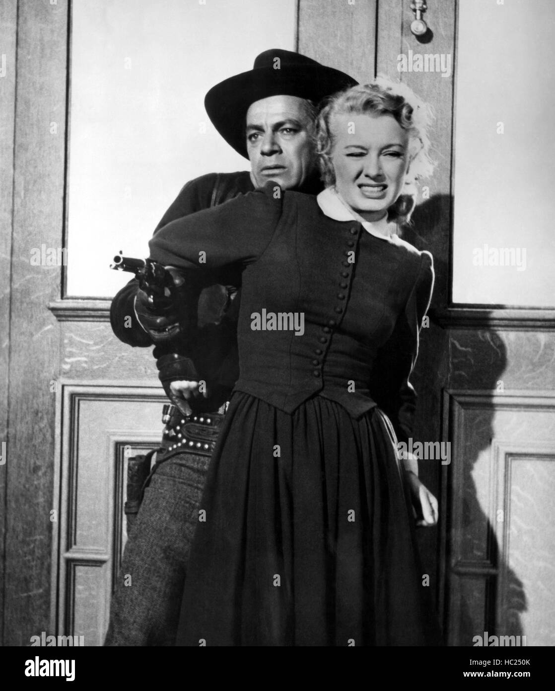 MAN IN THE SADDLE, l-r: Richard Rober, Ellen Drew, 1951 Stock Photo - Alamy