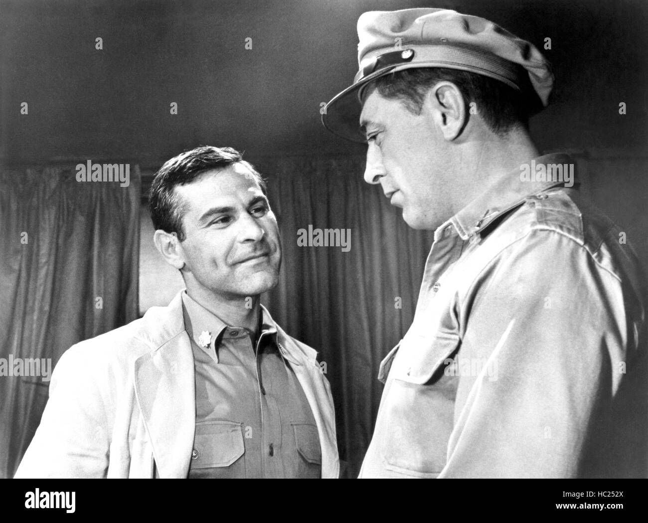 MAN IN THE MIDDLE, from left: Sam Wanamaker, Robert Mitchum, 1963 ...