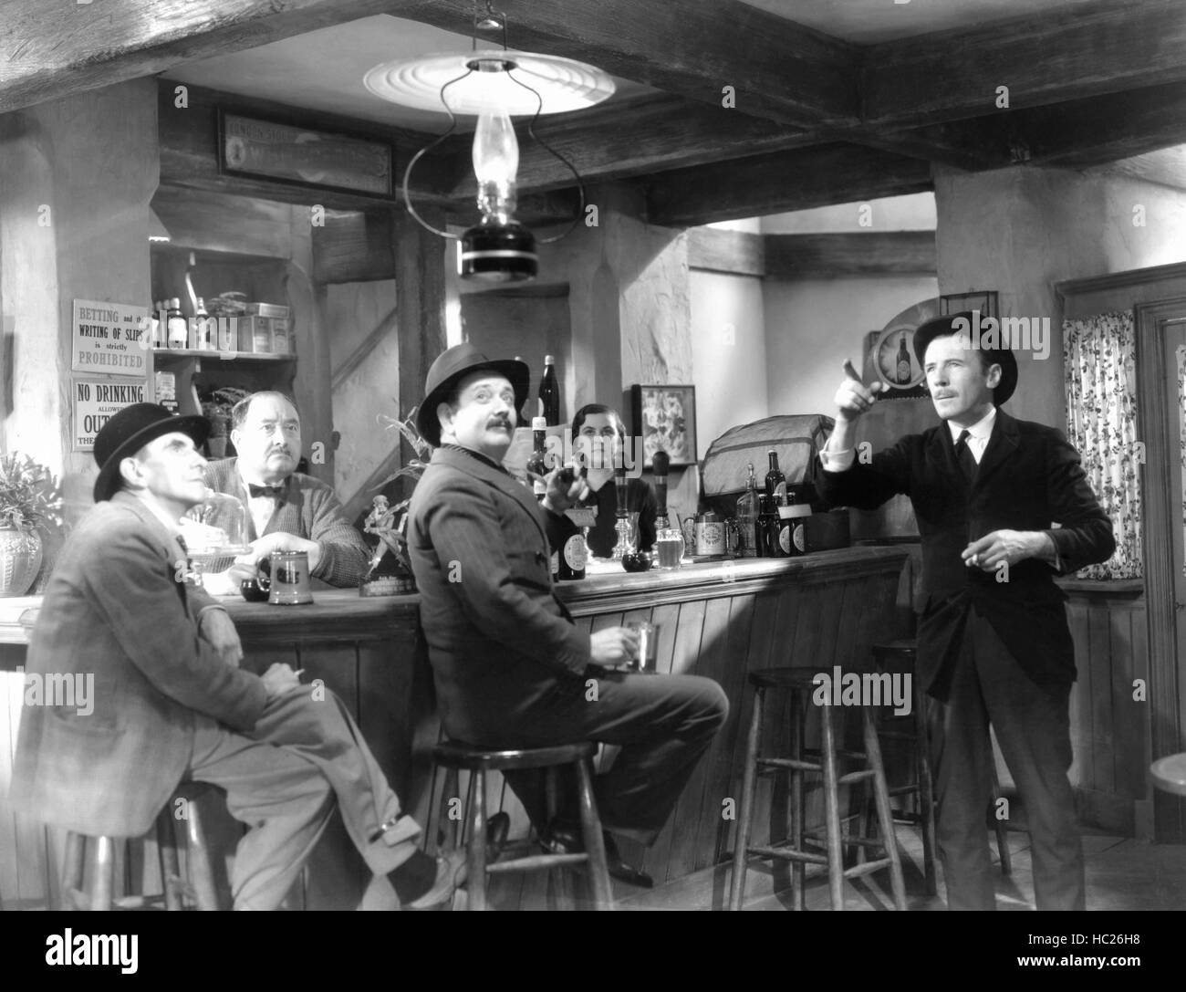 THE MAN WHO COULD WORK MIRACLES, Bruce Winston (behind bar left ...