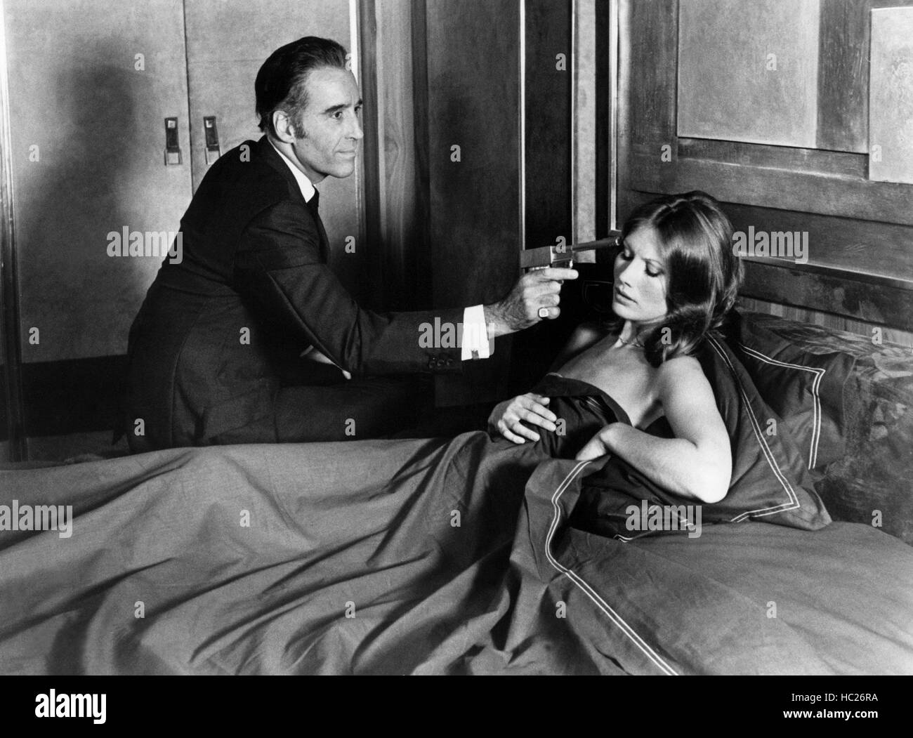 MAN WITH THE GOLDEN GUN, Christopher Lee, Maud Adams, 1974 Stock Photo ...