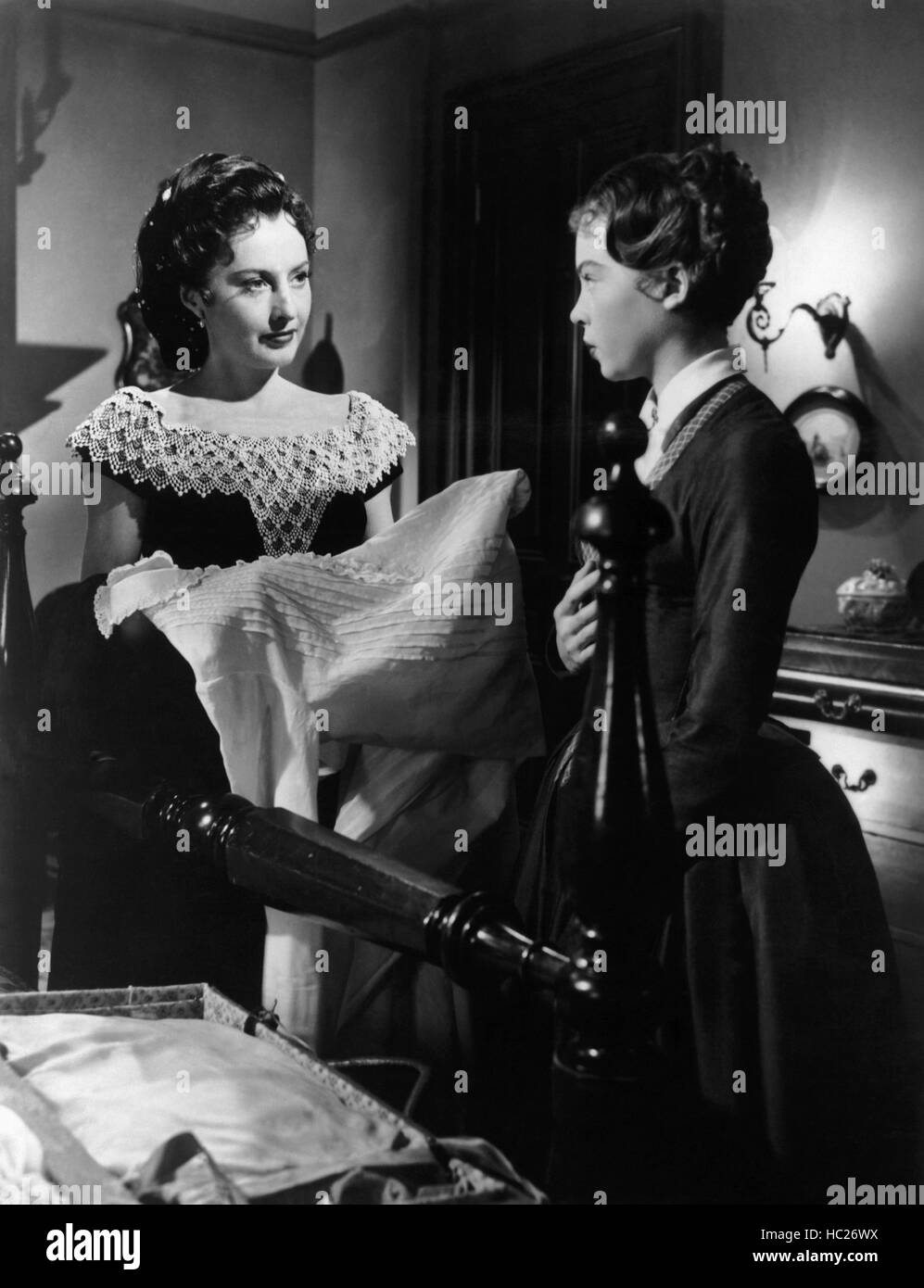 THE MAN WITH A CLOAK, Barbara Stanwyck, Leslie Caron, 1951 Stock Photo ...
