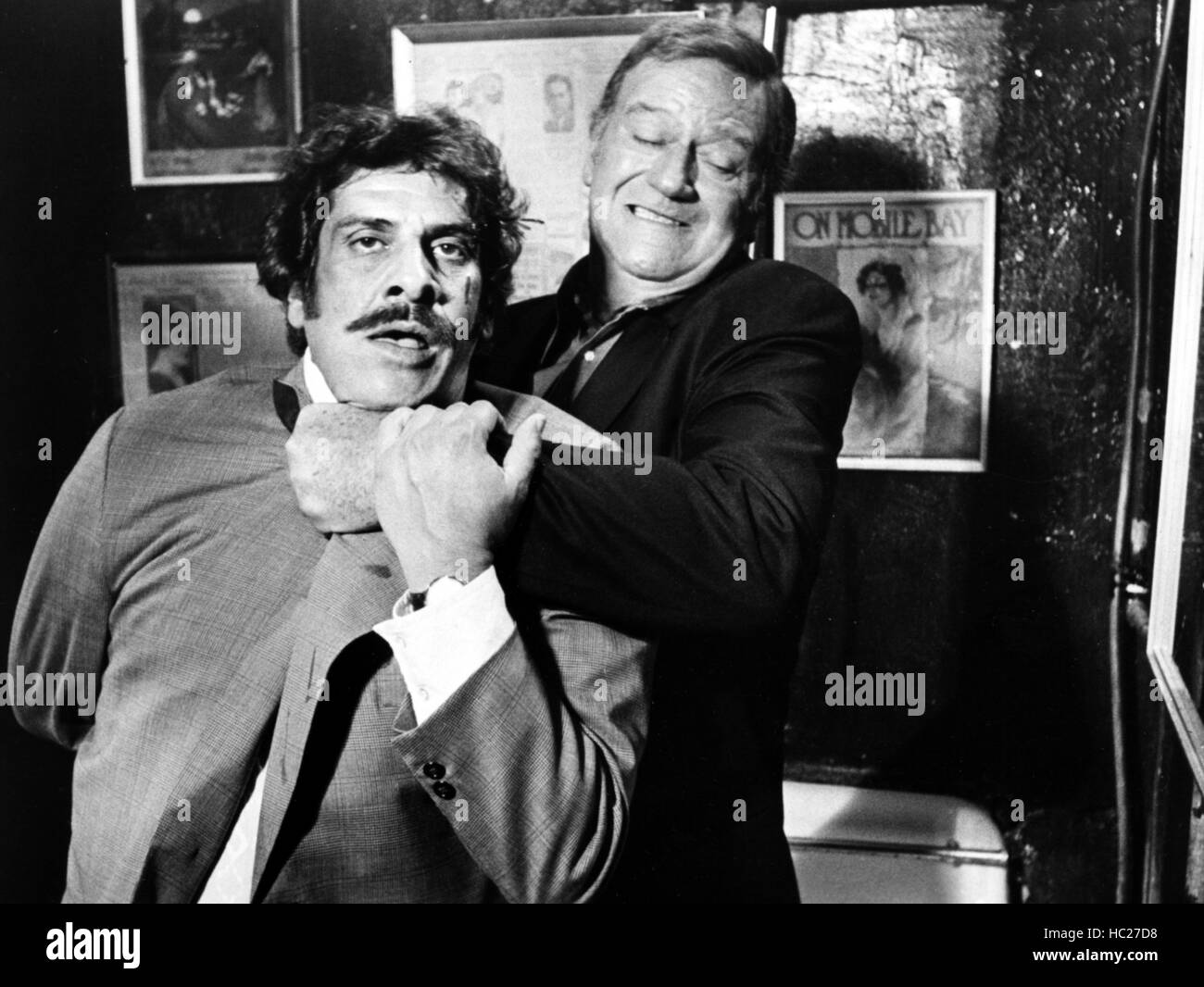 MCQ, Al Lettieri, John Wayne, 1974 Stock Photo - Alamy