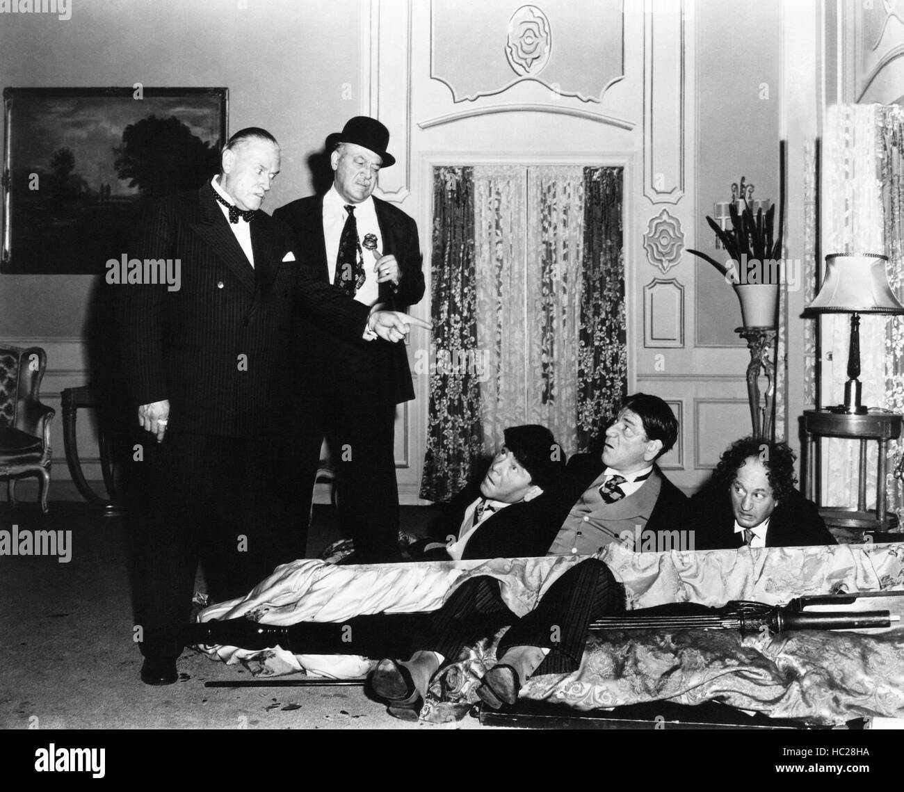 A MISSED FORTUNE, from left: Vernon Dent, Stanley Blystone, Moe Howard ...