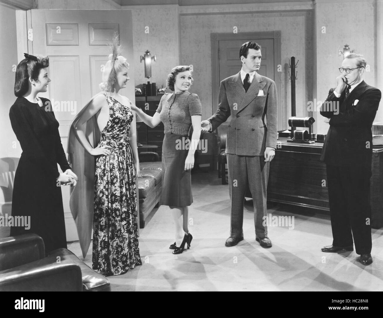 MISBEHAVING HUSBANDS, Gig Young (second from right), Harry Langdon ...