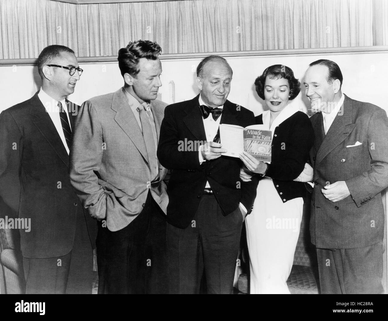 MIRACLE IN THE RAIN, from left: producer Frank P. Rosenberg, Van ...