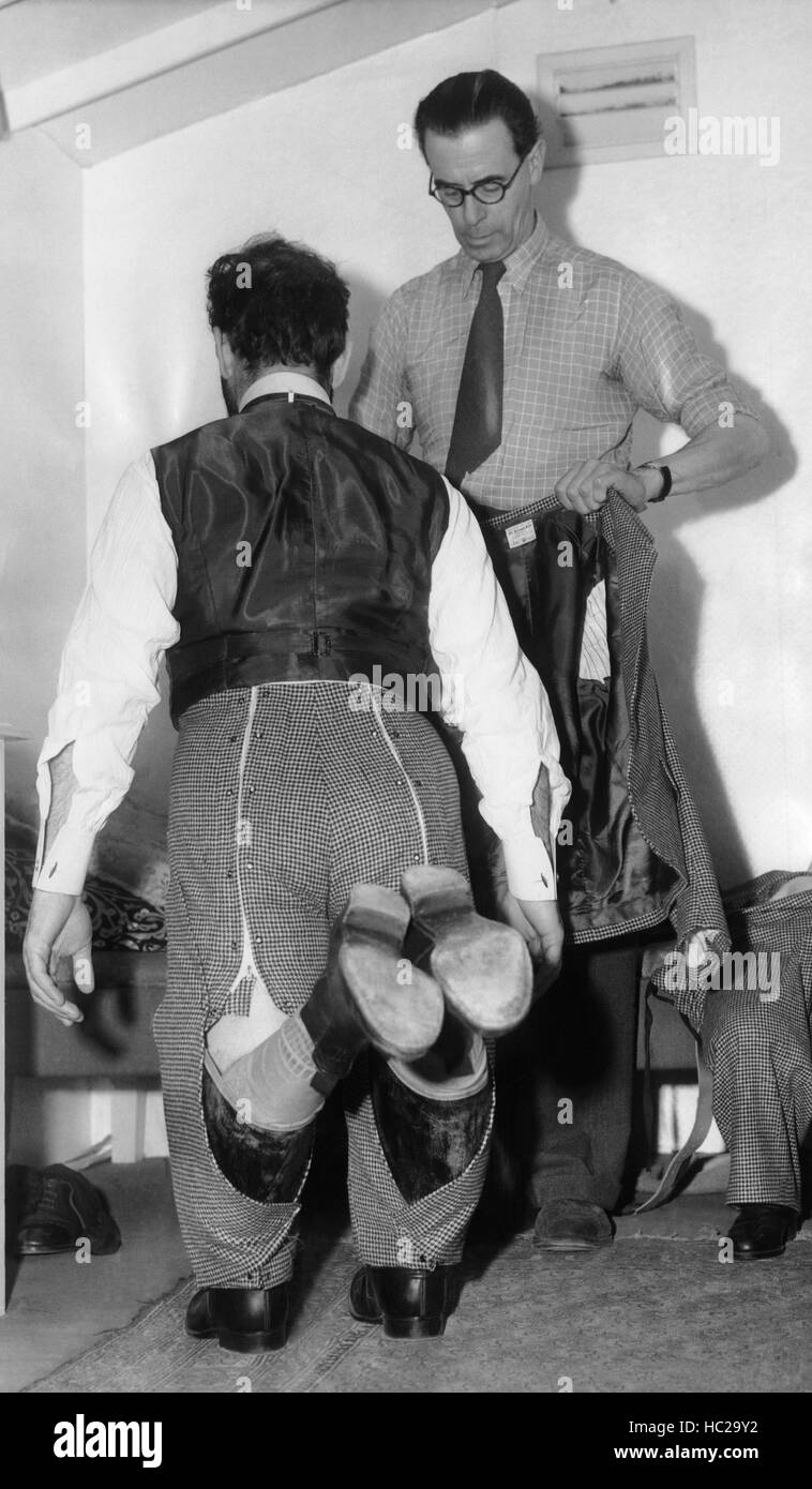MOULIN ROUGE, Jose Ferrer, after being strapped into prosthetic legs ...