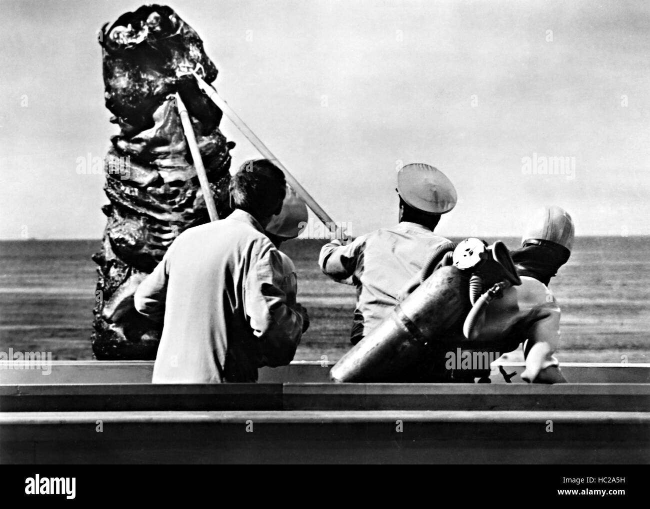 THE MONSTER THAT CHALLENGED THE WORLD, from left: Hans Conried, Tim ...