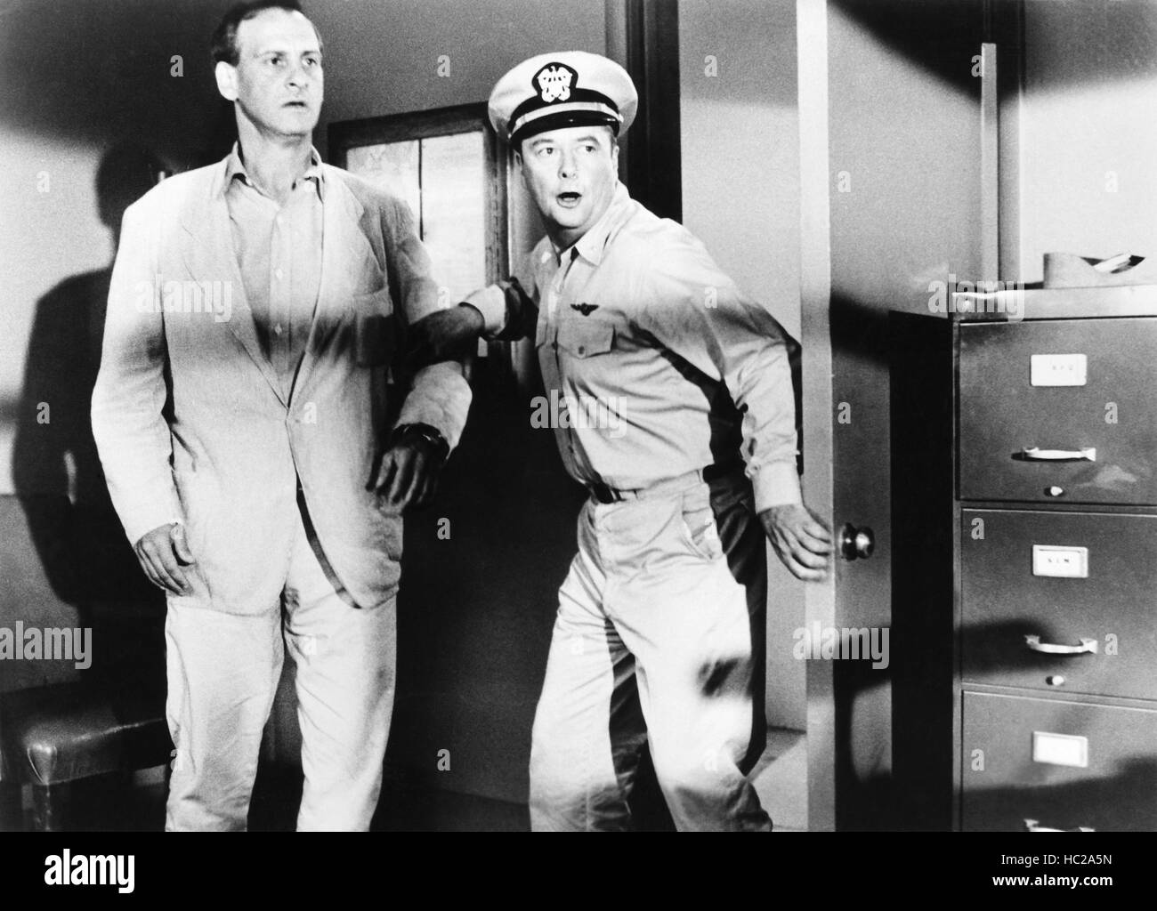 THE MONSTER THAT CHALLENGED THE WORLD, from left: Hans Conried, Tim ...