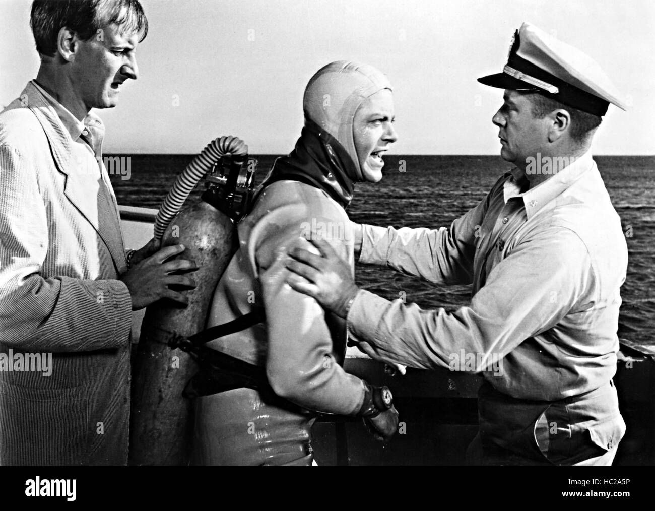 THE MONSTER THAT CHALLENGED THE WORLD, from left: Hans Conried, Max ...