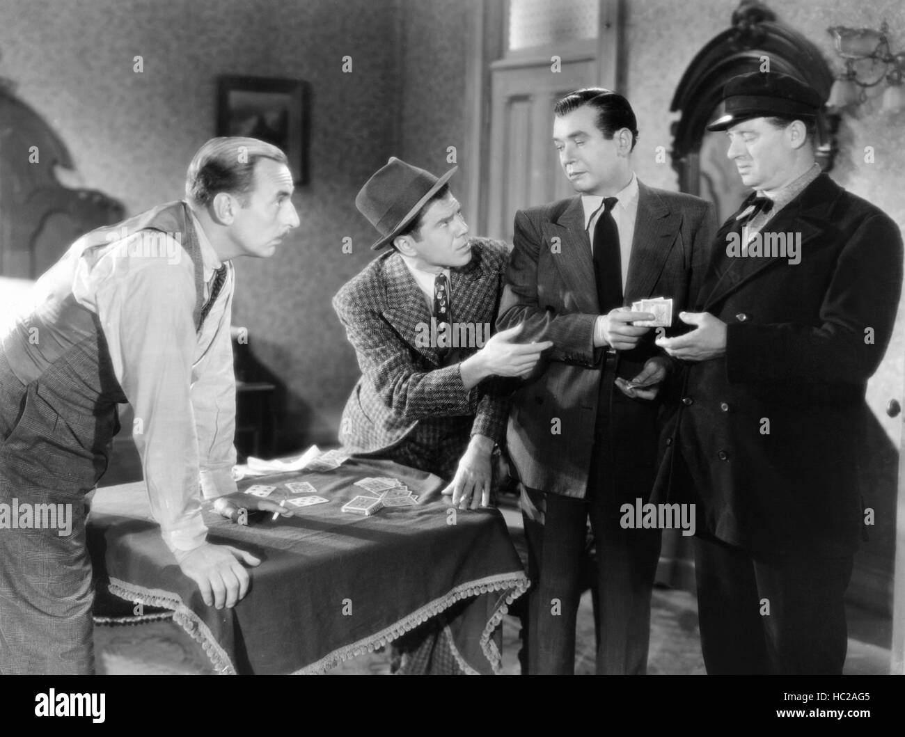 THE MUSIC GOES 'ROUND, from left: Douglass Dumbrille, Lionel Stander ...