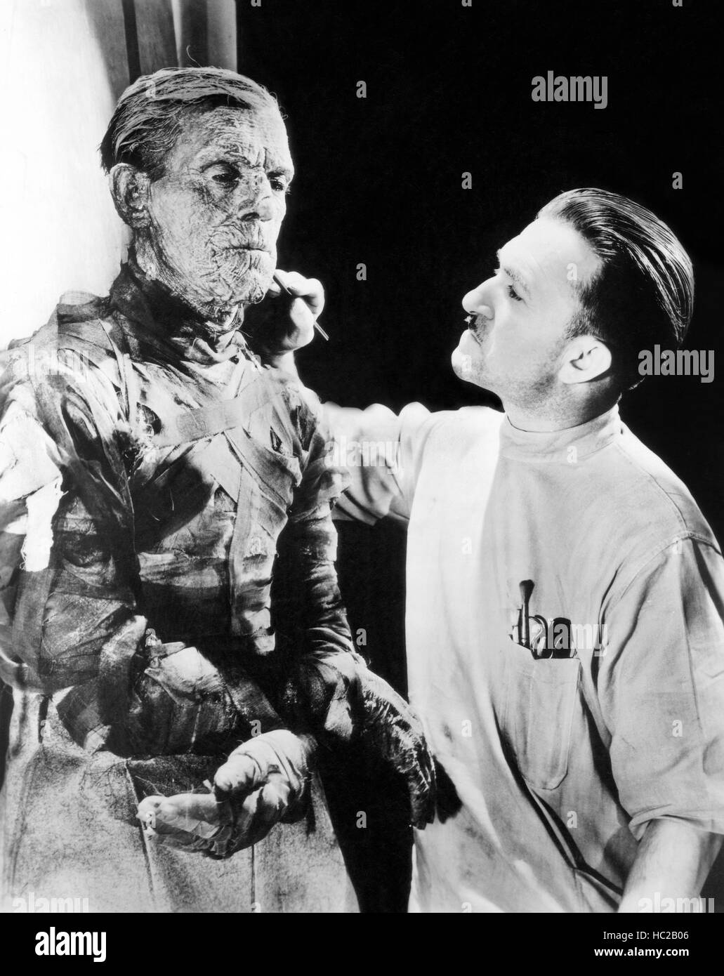 THE MUMMY, Boris Karloff being made up for his role by Jack P. Pierce ...