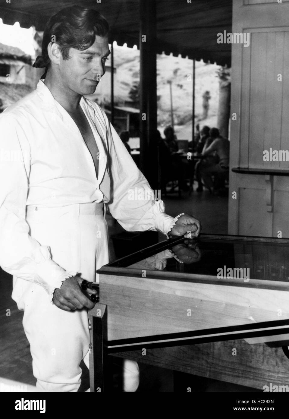 MUTINY ON THE BOUNTY, Clark Gable, playing pinball on-set, 1935 Stock ...