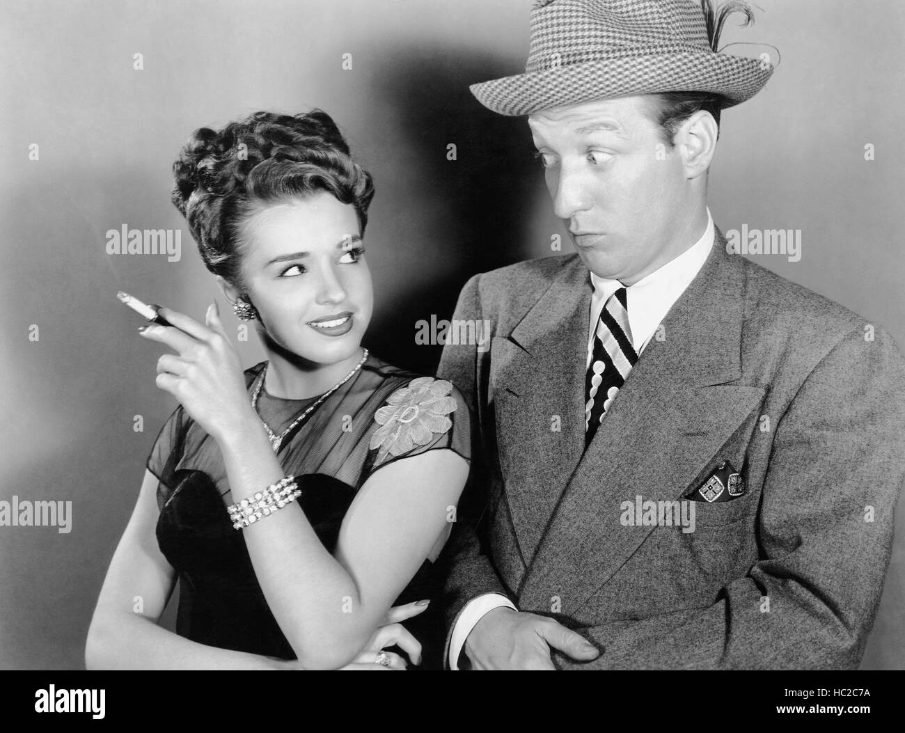 NEWS HOUNDS, from left, Nita Bieber, Huntz Hall, 1947 Stock Photo - Alamy